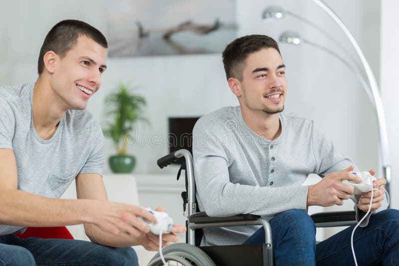 Young Friends Playing Video Games at Home Stock Image - Image of ...