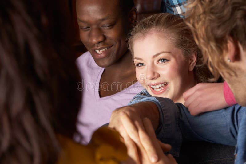 Young Friends Sitting Together Stock Image - Image of male, laughing ...
