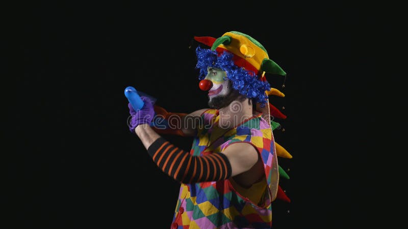 Young Funny Clown Making a Poodle from a Balloon Stock Video - Video of ...