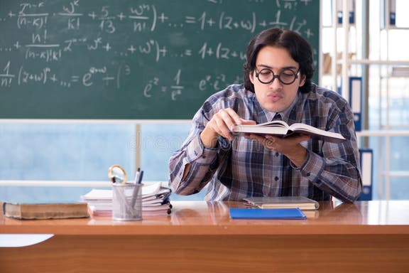 The Young Funny Math Teacher in Front of Chalkboard Stock Image - Image ...