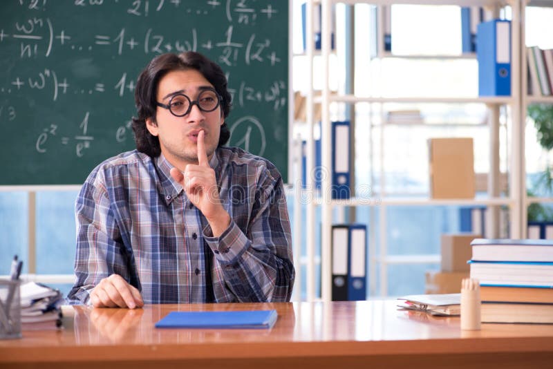 The Young Funny Math Teacher in Front of Chalkboard Stock Image - Image ...