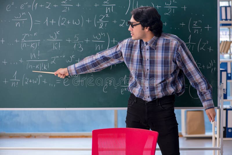 The Young Funny Math Teacher in Front of Chalkboard Stock Image - Image ...