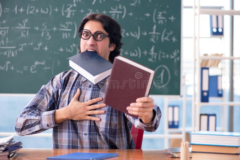 The Young Funny Math Teacher in Front of Chalkboard Stock Image - Image ...