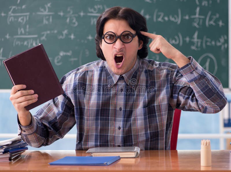 Young Funny Math Teacher in Front of Chalkboard Stock Photo - Image of ...