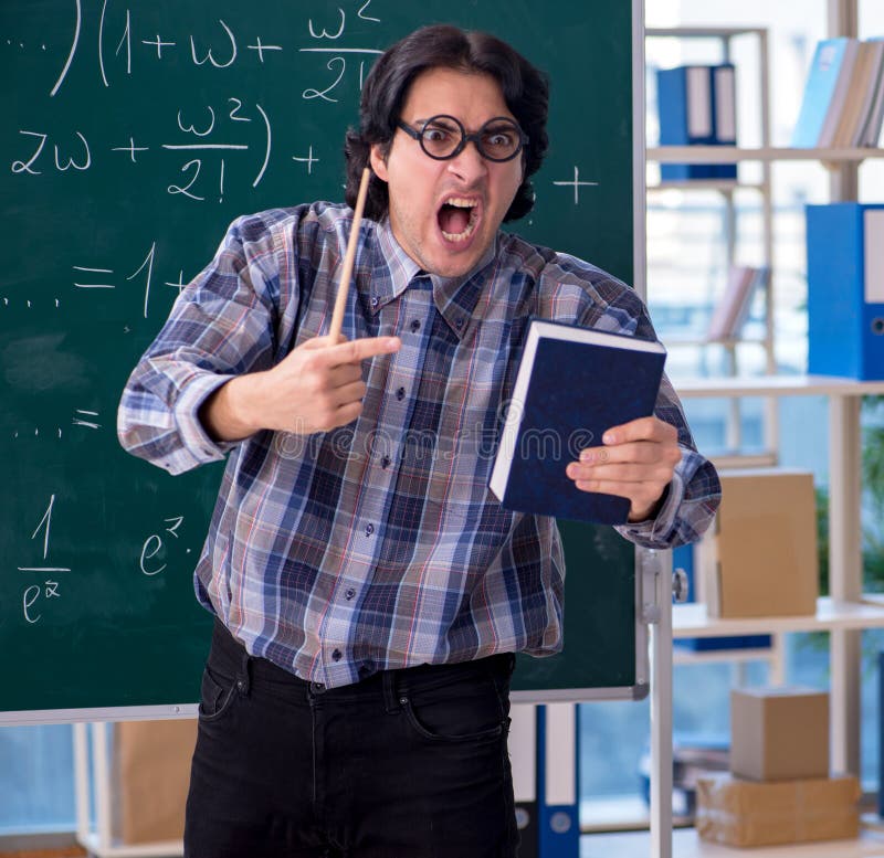 Young Funny Math Teacher in Front of Chalkboard Stock Photo - Image of ...