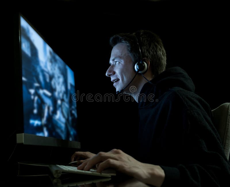 Young gamer in the dark stock photo. Image of isolated - 87940348