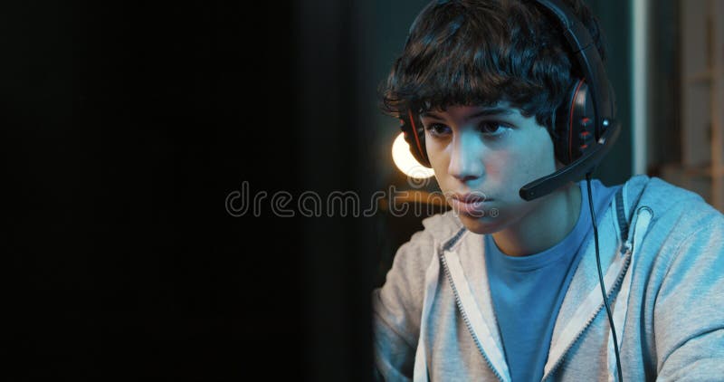 Young Gamer Playing Online Video Games Stock Photo - Image of ...