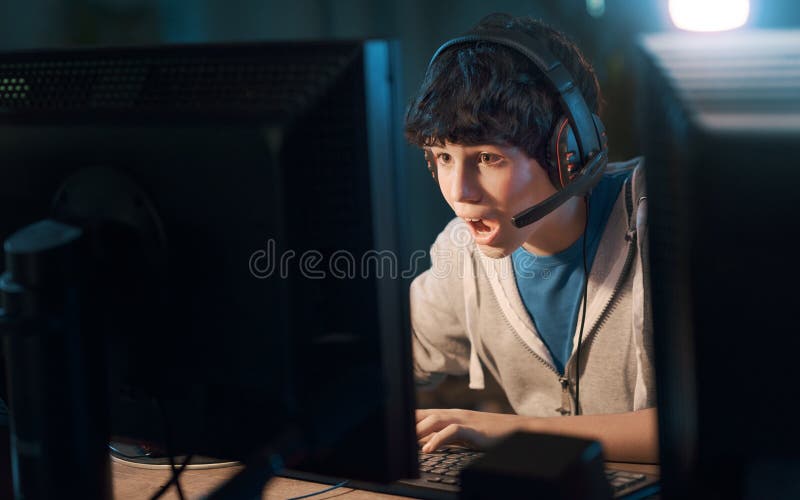 Young Gamer Playing Online Video Games Stock Photo - Image of network ...