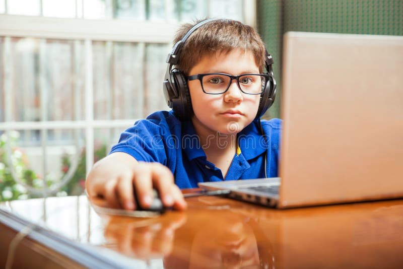 Young gamer using a laptop stock photo. Image of leisure - 51315012