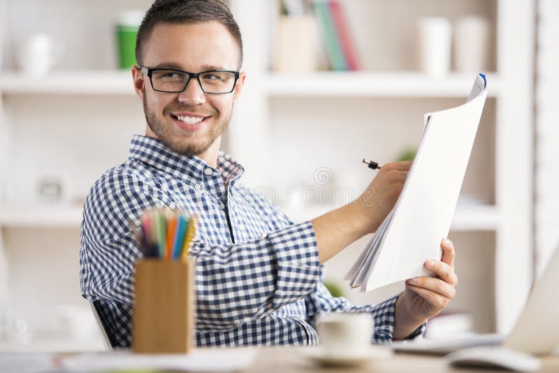 Young Gentleman Doing Paperwork Stock Image - Image of paper ...