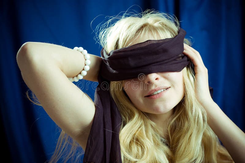 Blindfolded Woman Walking through Light Bulbs Shaped As Junk Food Green ...