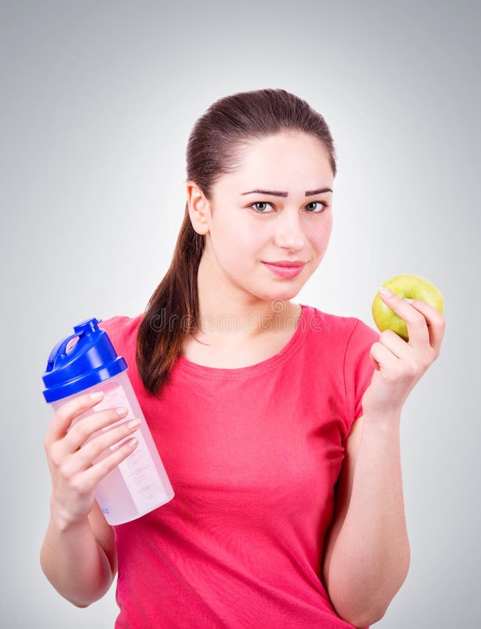 Young Girl with Apple and Shaker Stock Image - Image of athletic ...