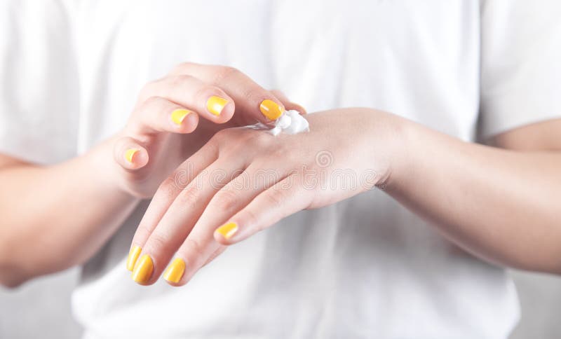 Young Girl Applying Cream into Hand Stock Image - Image of nourishing ...