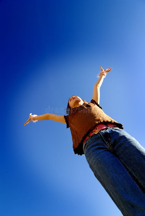 Young Girl with Arms Raised Stock Photo - Image of peaceful, success ...