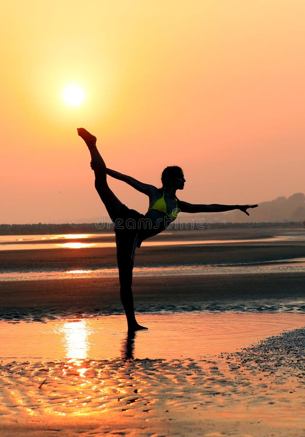 Young Girl in Backlight Doing Gymnastics on the Seashore Stock Image ...