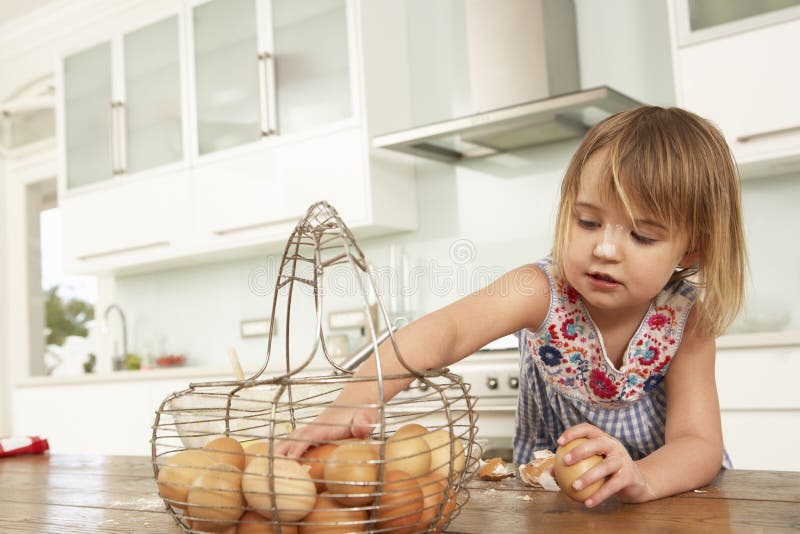 Young Girl Baking Cakes in Kitchen Stock Image - Image of smiling ...
