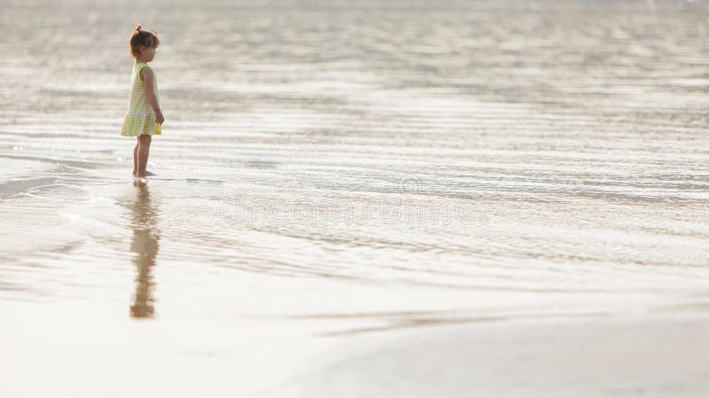 Young girl on the beach, Cute little girl on the beach model