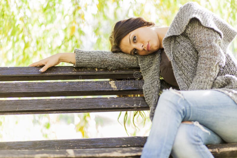 Young girl on the bench stock image. Image of model, brunette - 27682439