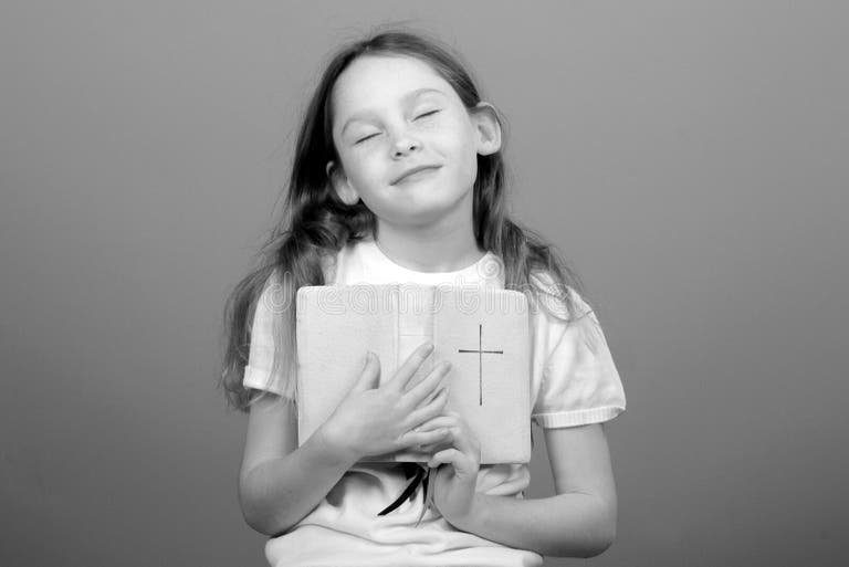 Young girl with Bible stock photo. Image of calm, book - 6298596