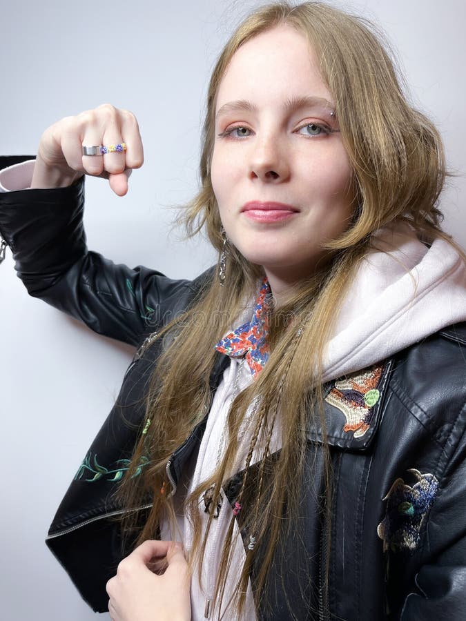A Young Girl in a Black Leather Jacket Stock Photo - Image of dressed ...