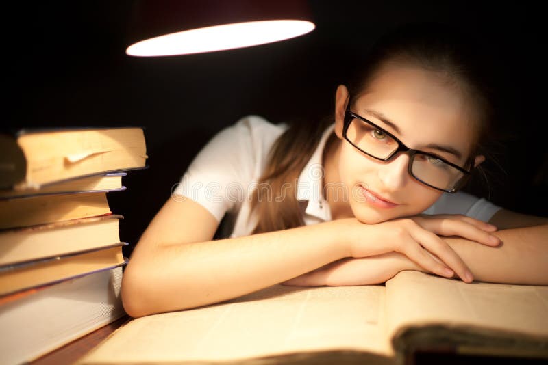 Girl Reading Book Under Table Lamp Table Photos - Free & Royalty-Free ...