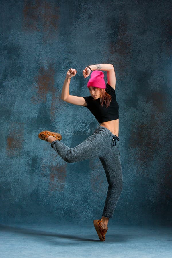 Young Girl Break Dancing on Wall Background. Stock Photo - Image of ...