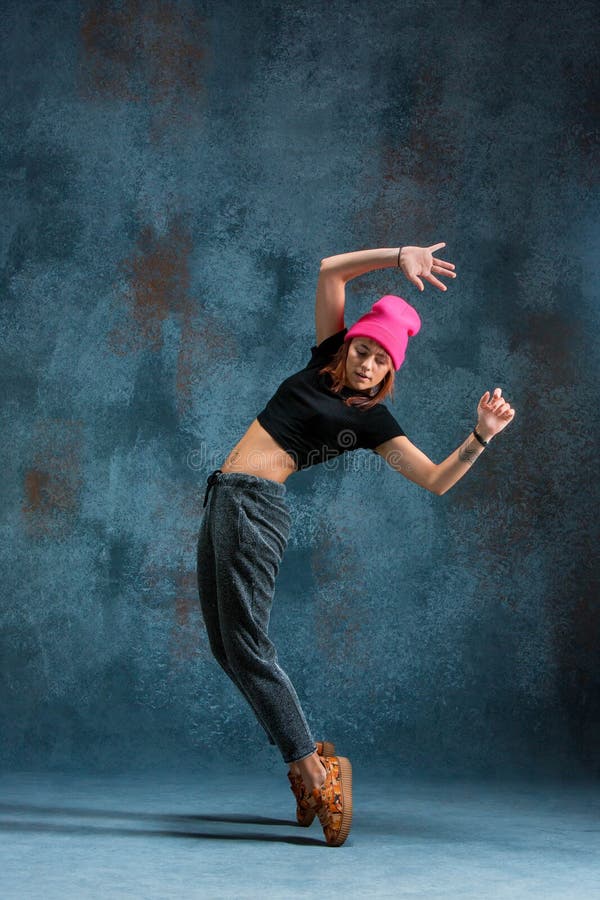 Young Girl Break Dancing on Wall Background. Stock Image - Image of ...
