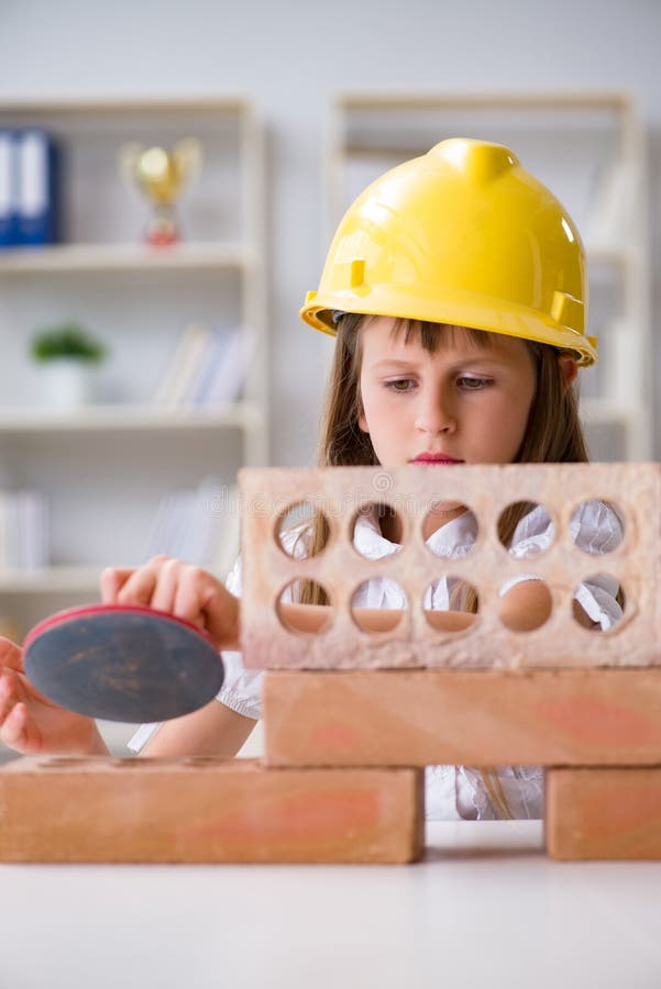 The Young Girl Building with Construction Bricks Stock Photo - Image of ...