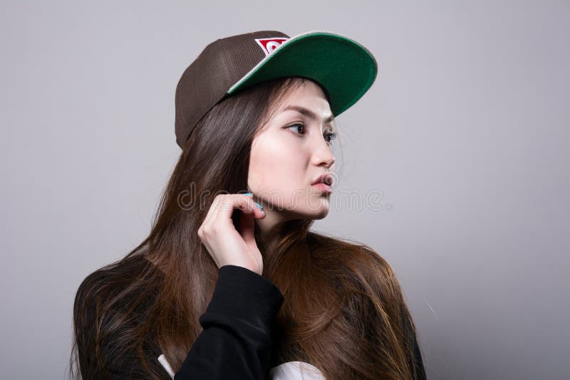 Young girl in a cap. stock image. Image of attractive - 53119305