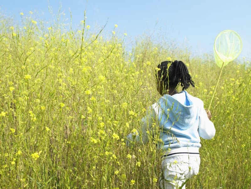 Young Girl Chasing Butterflies Stock Image - Image of natural, blooming ...