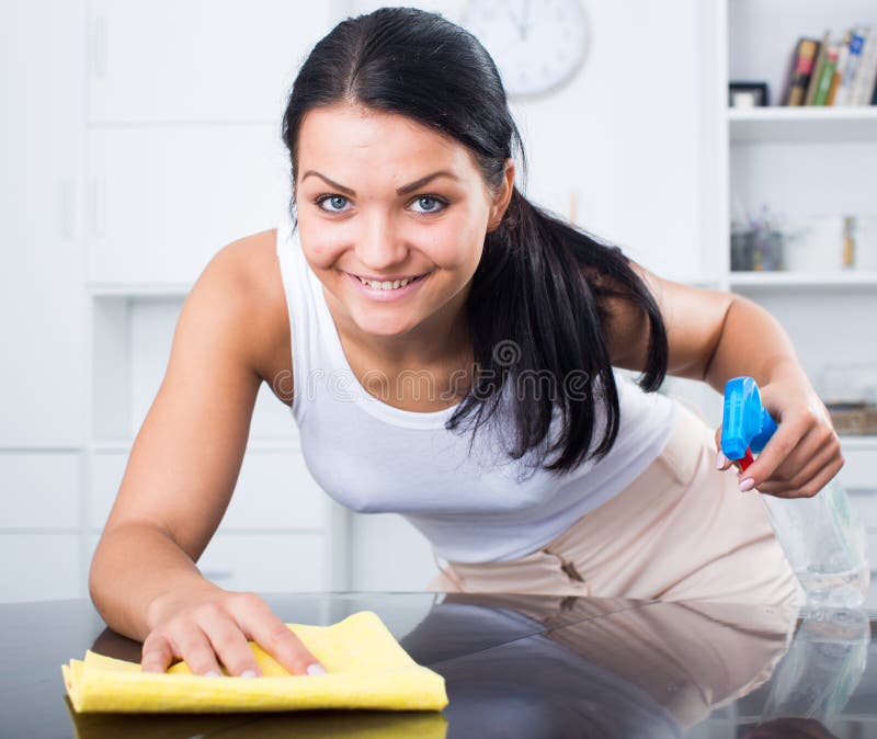 Young Girl Cleaning in House Stock Photo - Image of indoors, apron ...