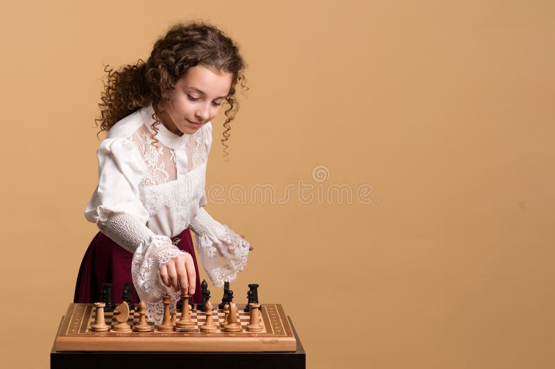 Young Girl Concentrating while Moving Chess Piece Stock Image - Image ...