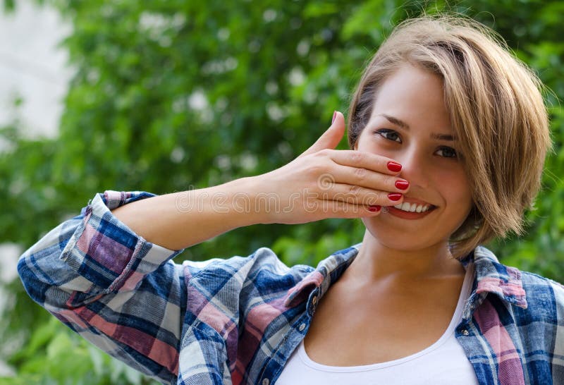 Young Girl Covers Her Smile with His Hand Stock Photo - Image of person ...
