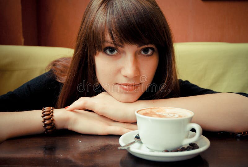 Young Girl with a Cup of Coffee Stock Image - Image of drink, eyes ...