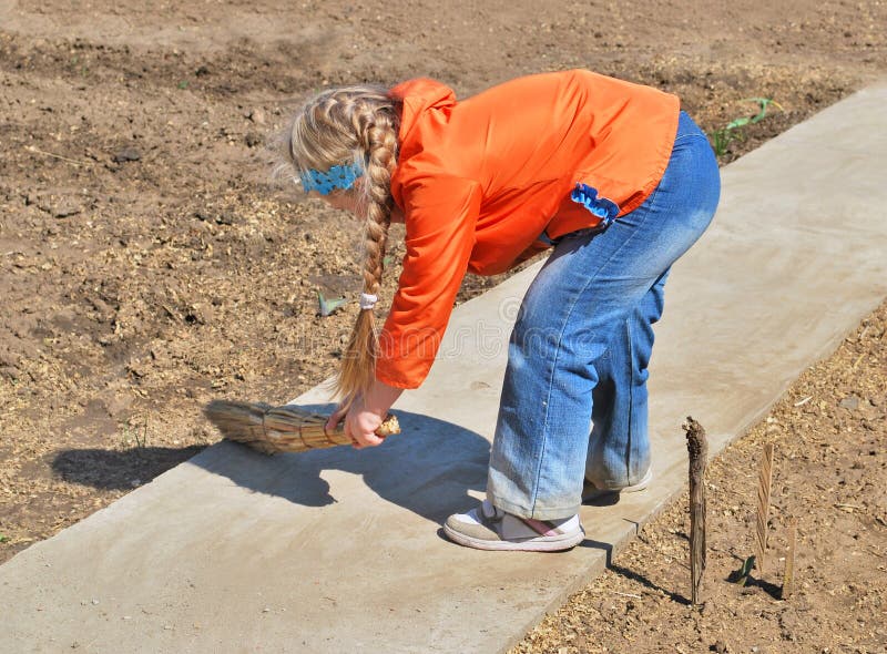 Young Girl Does Sweeping a Path Stock Photo - Image of ground, concept ...