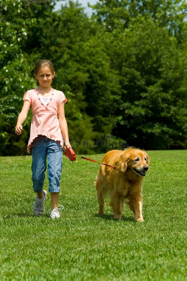 Young Girl with Dog stock image. Image of grass, spring - 2968755