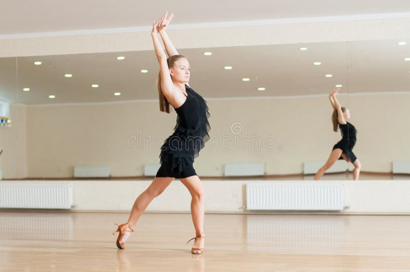 Young Girl Doing Exercises in a Dance Class Stock Image - Image of ...