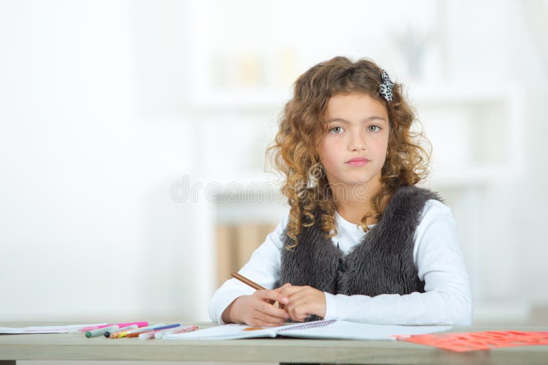 Young Girl Doing Assignment Stock Photo - Image of schoolbook, homework ...