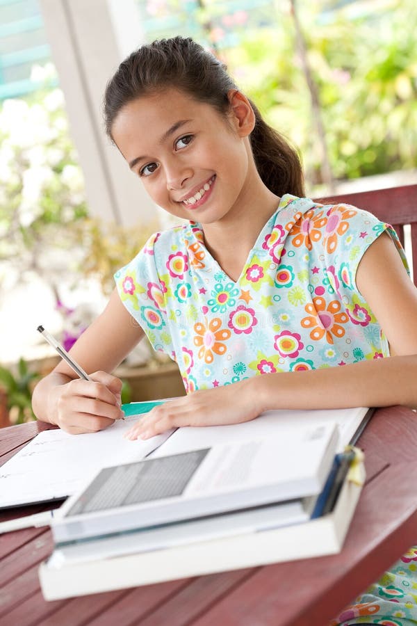 Young Girl Doing Her Homework in a Home Environment Stock Image - Image ...