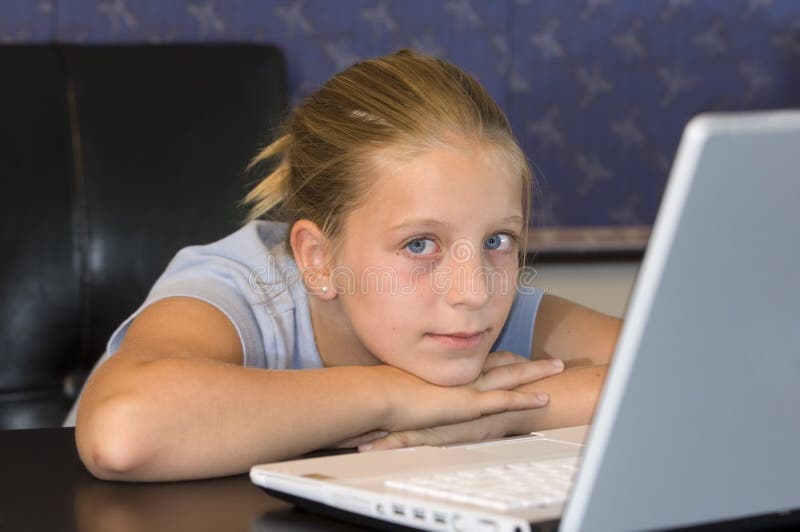 Young girl doing home work stock image. Image of attractive - 1376917