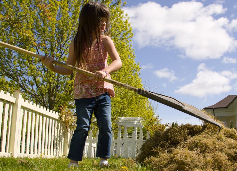 Young girl doing yardwork stock image. Image of allowance - 2256313