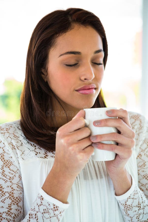 Young girl drink her tea stock photo. Image of dark, enjoyment - 65392992