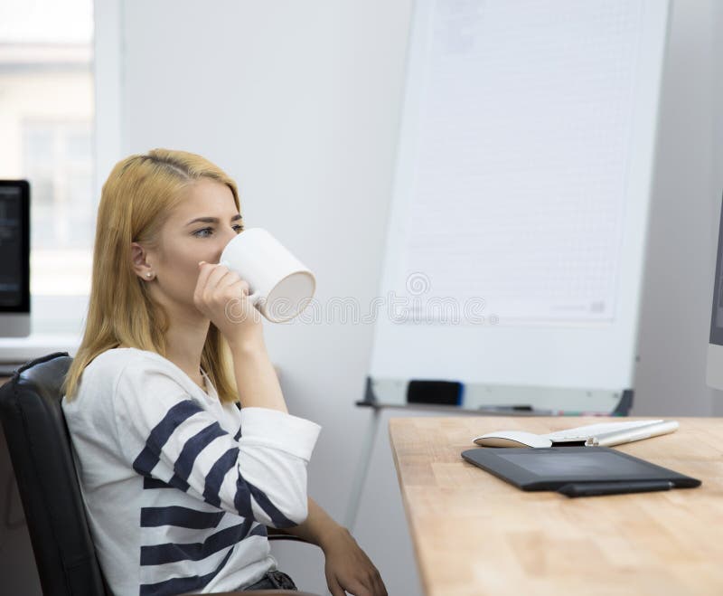 Young Girl Drinking Coffee in Office Stock Photo - Image of caucasian ...