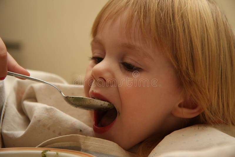 Young girl eating stock photo. Image of happy, smalll - 71975216