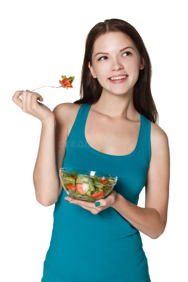 Young girl eating salad stock image. Image of eating - 35700781