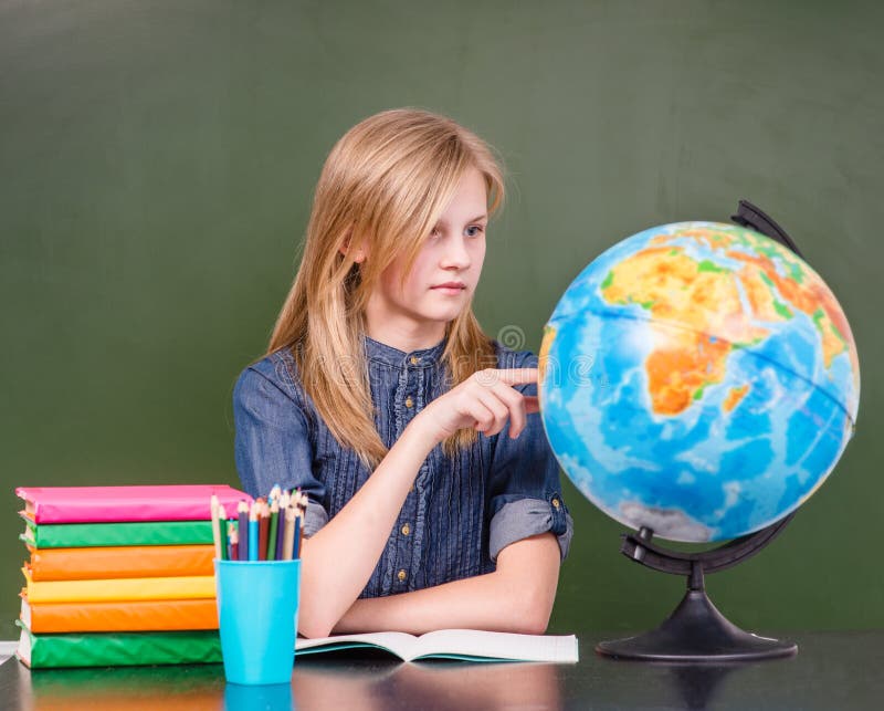 Young Girl Exploring the Globe Stock Photo - Image of girl, blackboard ...