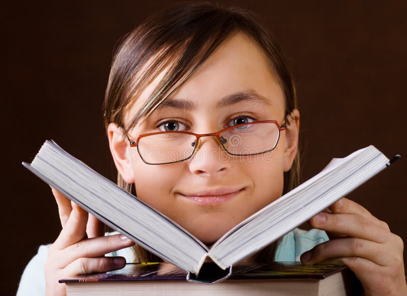 Young Girl Face with an Open Book Stock Photo - Image of looking ...