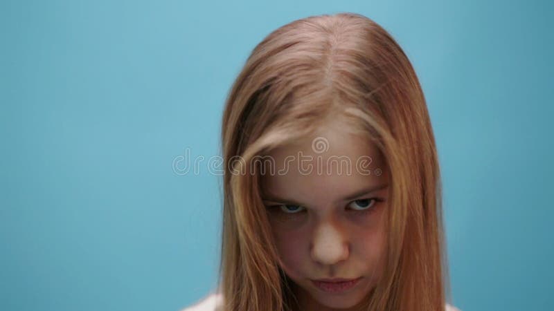 Young Girl Furrows Her Eyebrows Stock Footage - Video of angry, frown ...