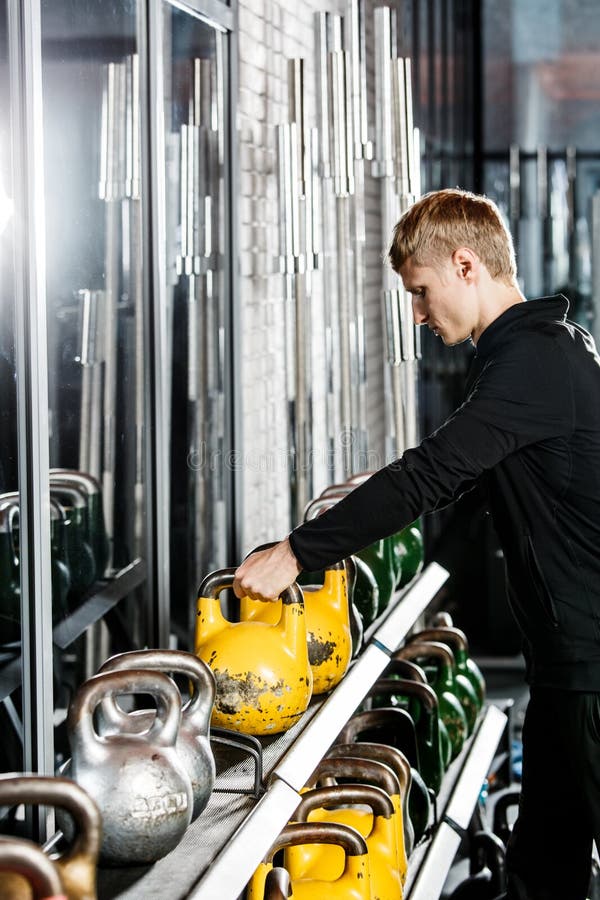 The Girl is Getting Ready for the Exercise with the Trainer Stock Image ...