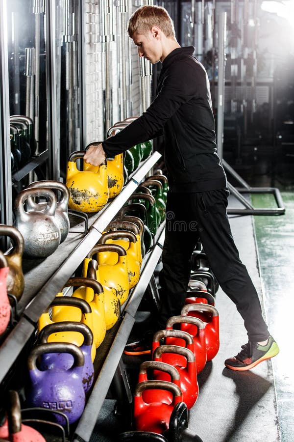 The Girl is Getting Ready for the Exercise with the Trainer Stock Photo ...